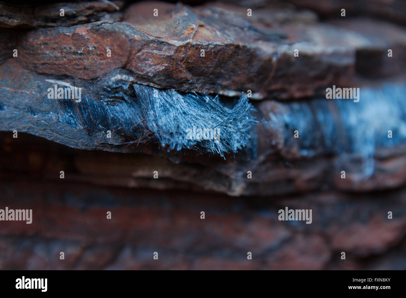 A piece of blue asbestos Stock Photo - Alamy