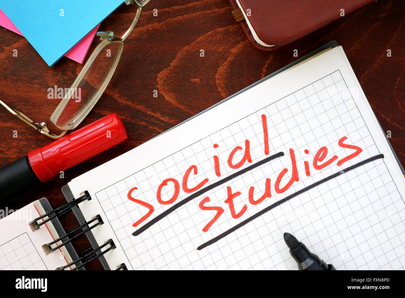 Social studies written in a notebook. Education concept Stock Photo - Alamy
