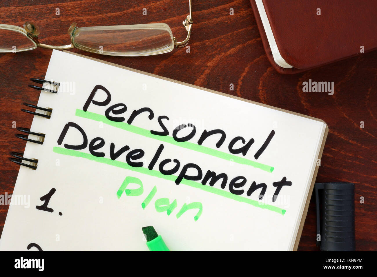 Personal development written in a notebook. Business concept Stock ...