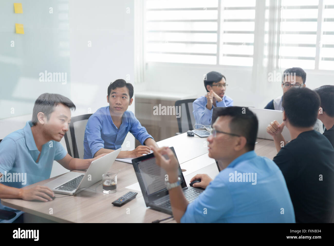 Asian business people group meeting room collaboration Stock Photo - Alamy