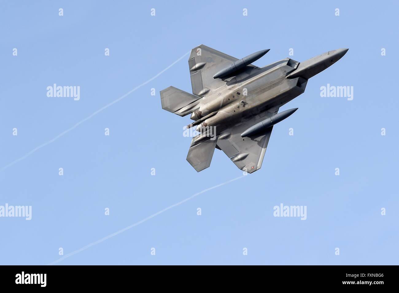 An U.S Air Force F-22 Raptor stealth fighter aircraft flies over Joint ...