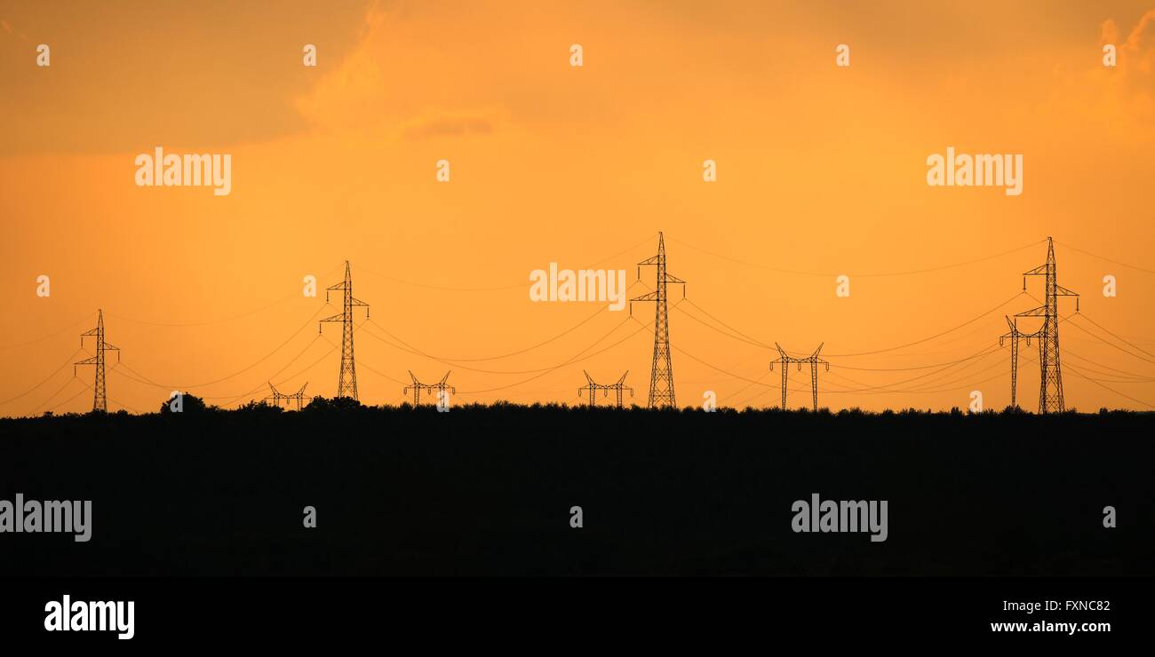 Electric lines on land Stock Photo - Alamy