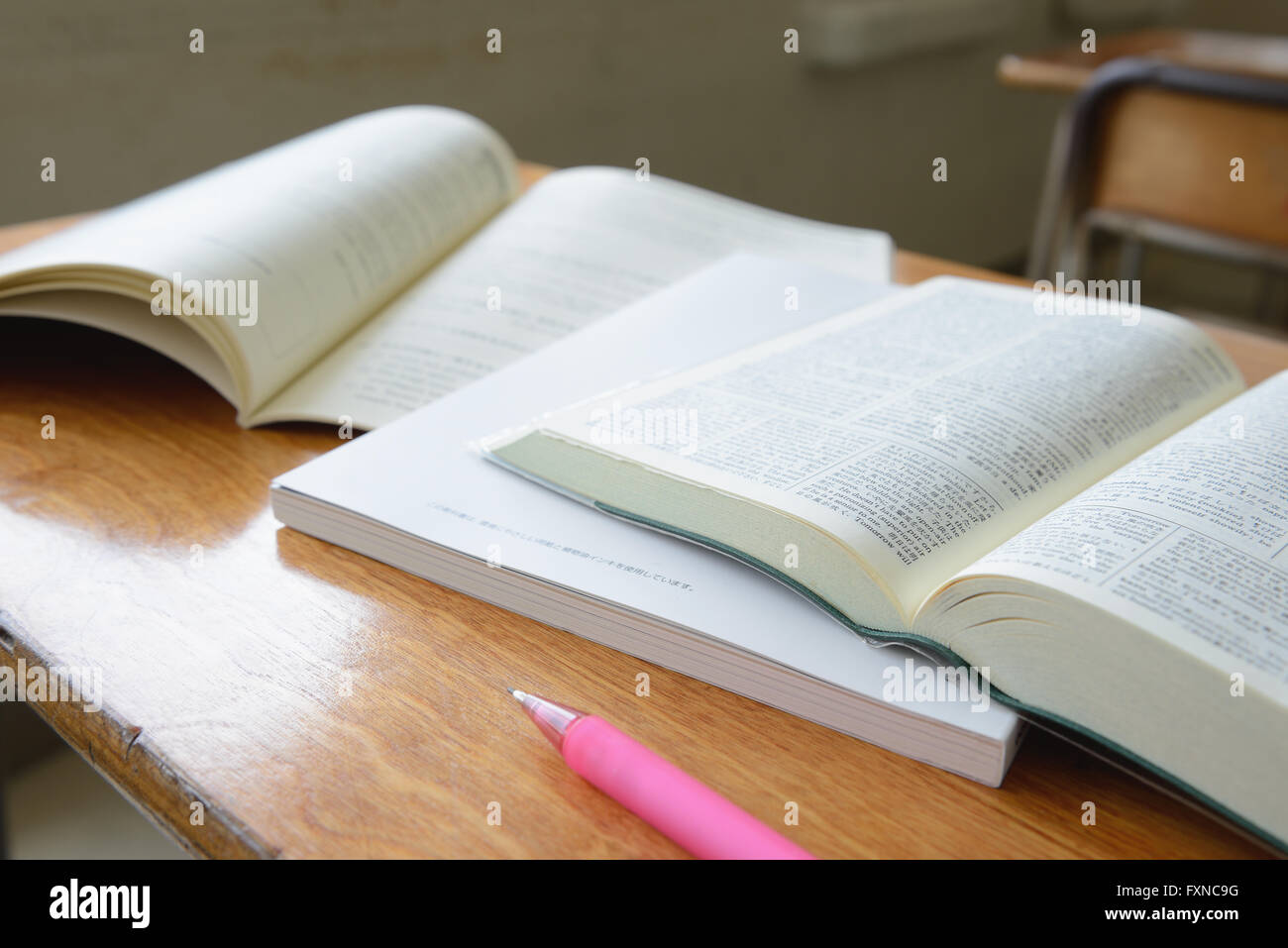 Notebook on school desk Stock Photo - Alamy