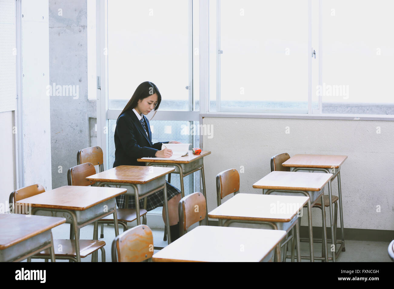 Japanese high-school student in empty classroom Stock Photo - Alamy