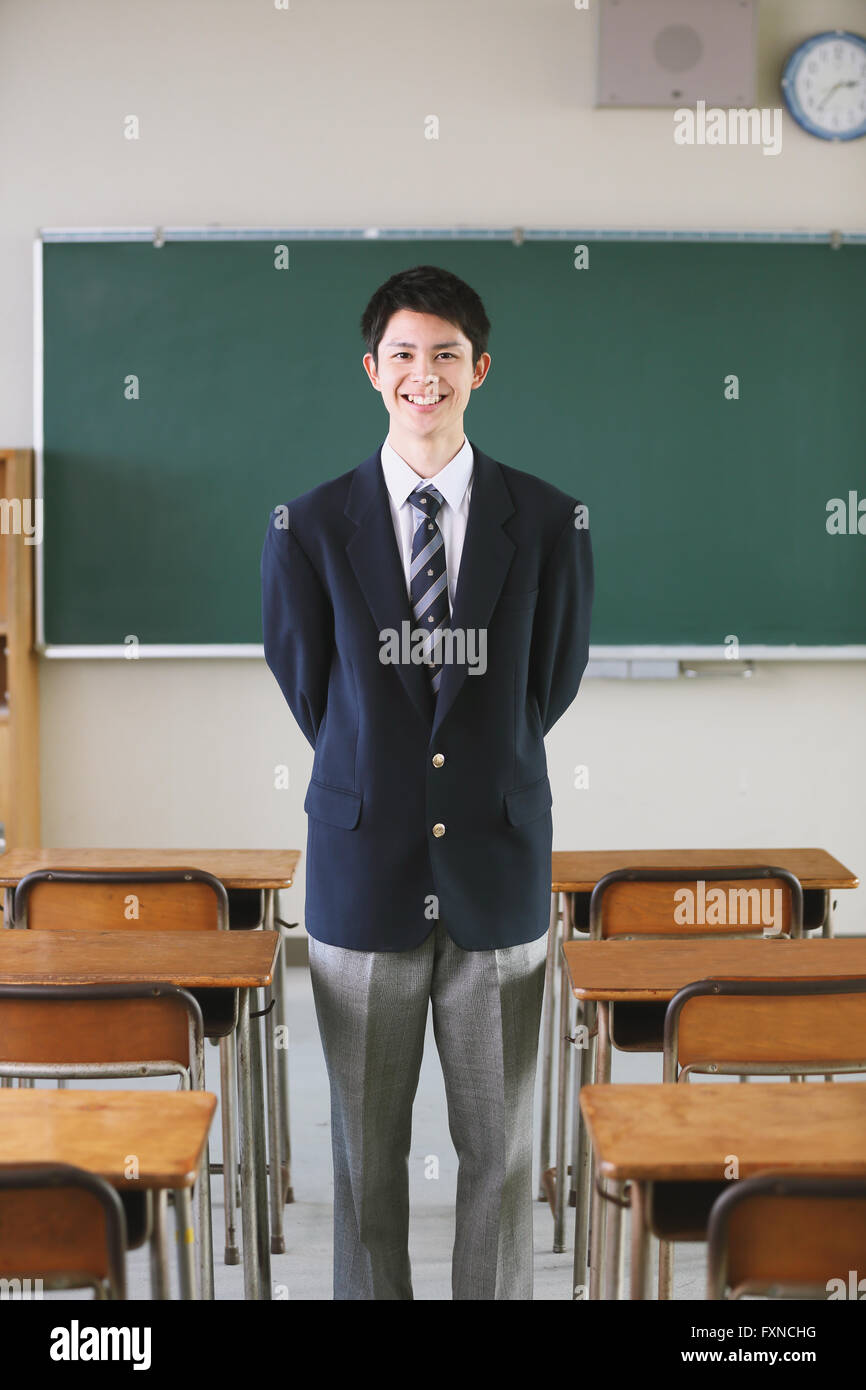 Japanese high-school student in front of classroom blackboard Stock ...