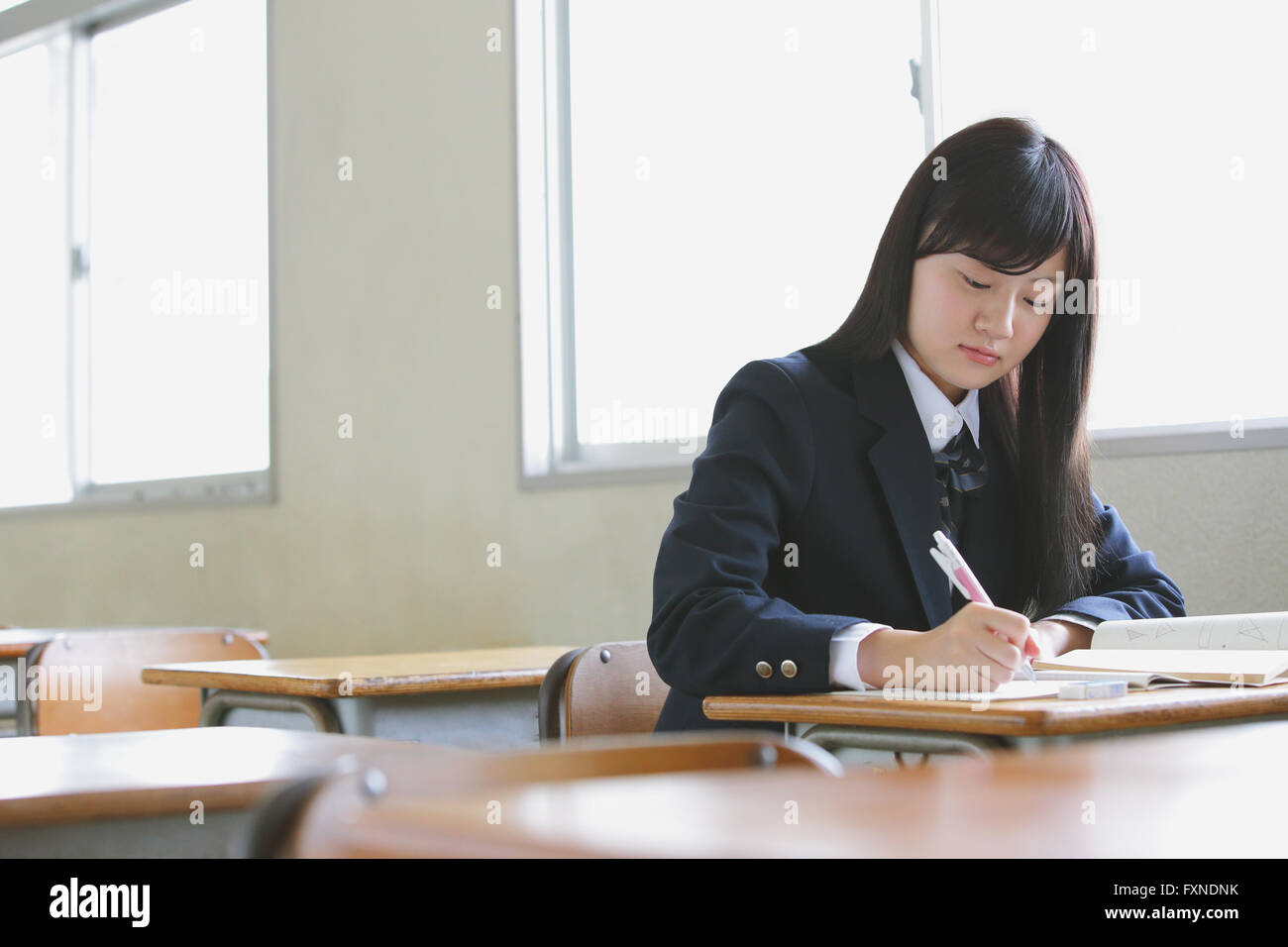 Japanese high-school student in empty classroom Stock Photo - Alamy