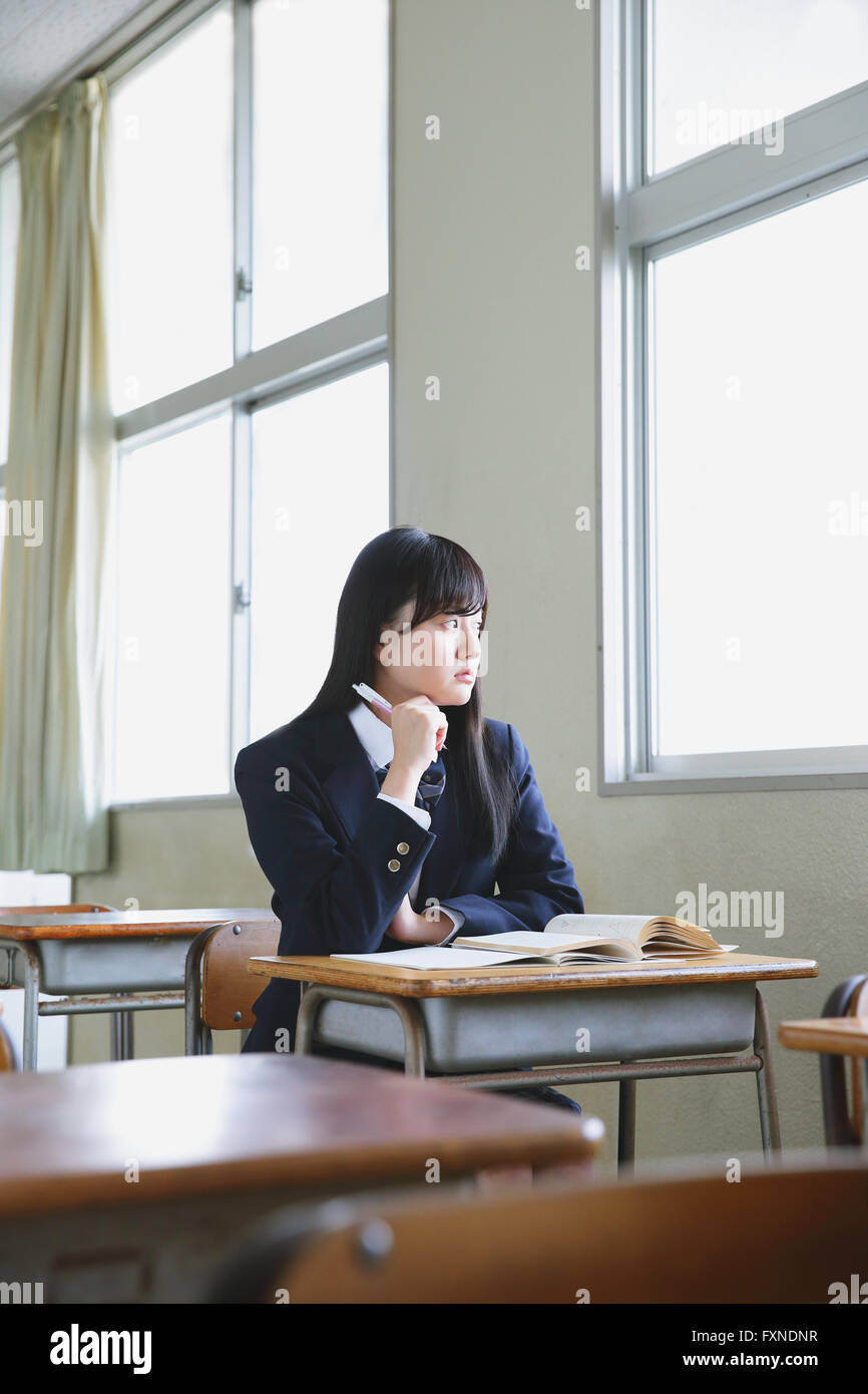 Japanese high-school student in empty classroom Stock Photo - Alamy