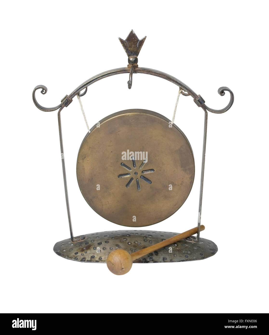 A gong hanging from a frame makes a resonating sound when struck with a ...