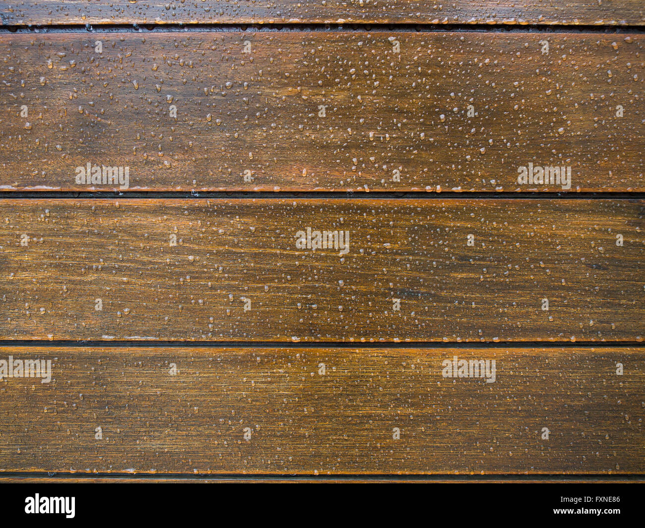 Many water drops on wooden surface made of planks Stock Photo - Alamy