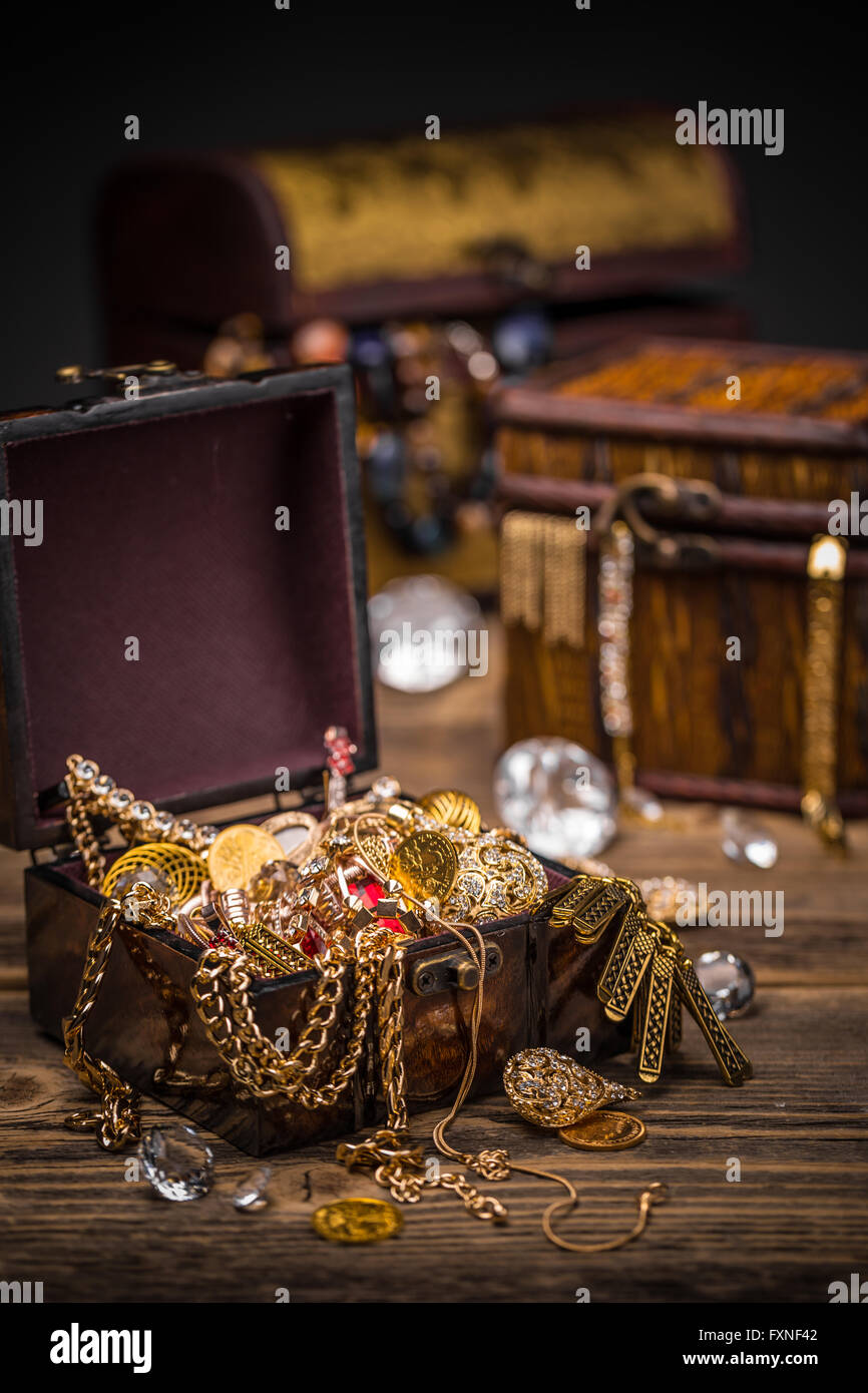 Treasure chest on wooden background Stock Photo - Alamy