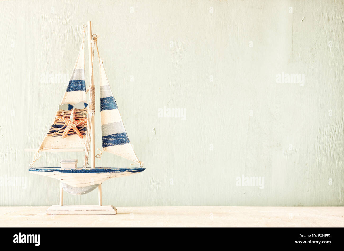wooden boat over wooden textured background. filtered image Stock Photo ...