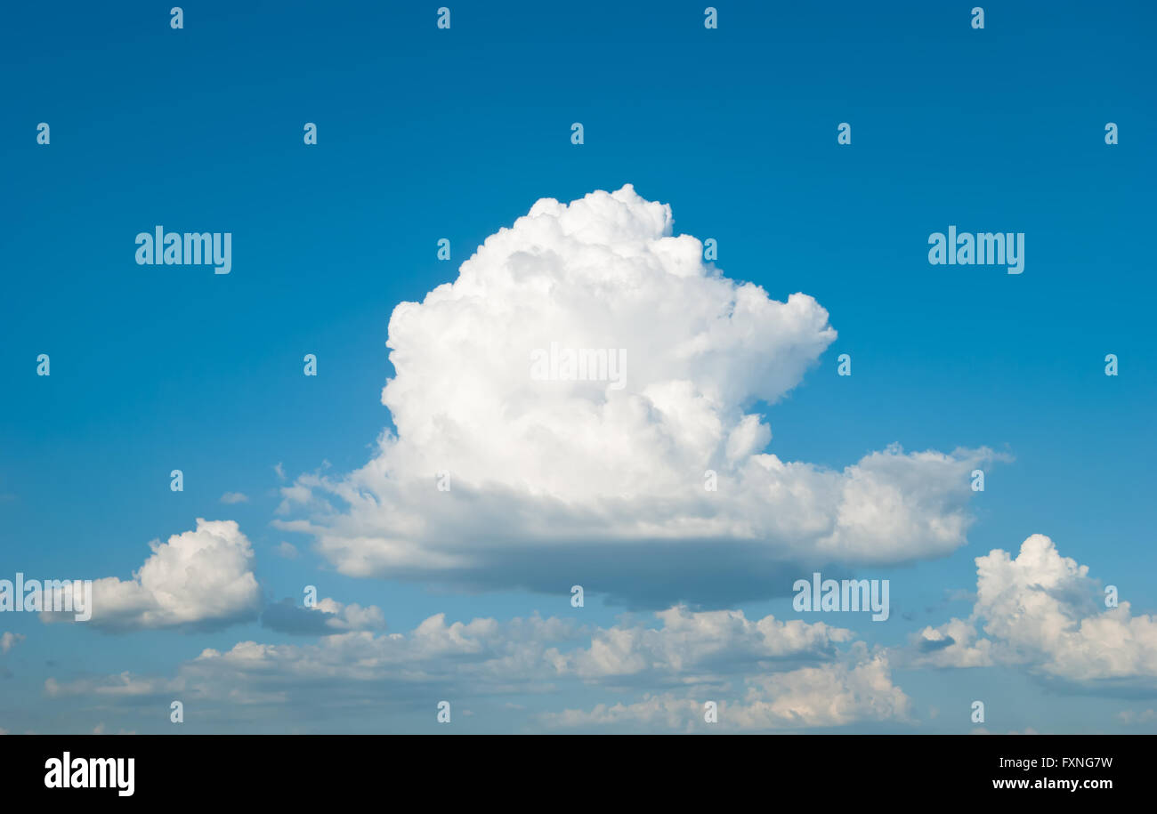 Big white cloud. Huge white cumulus cloud against blue sky Stock Photo ...