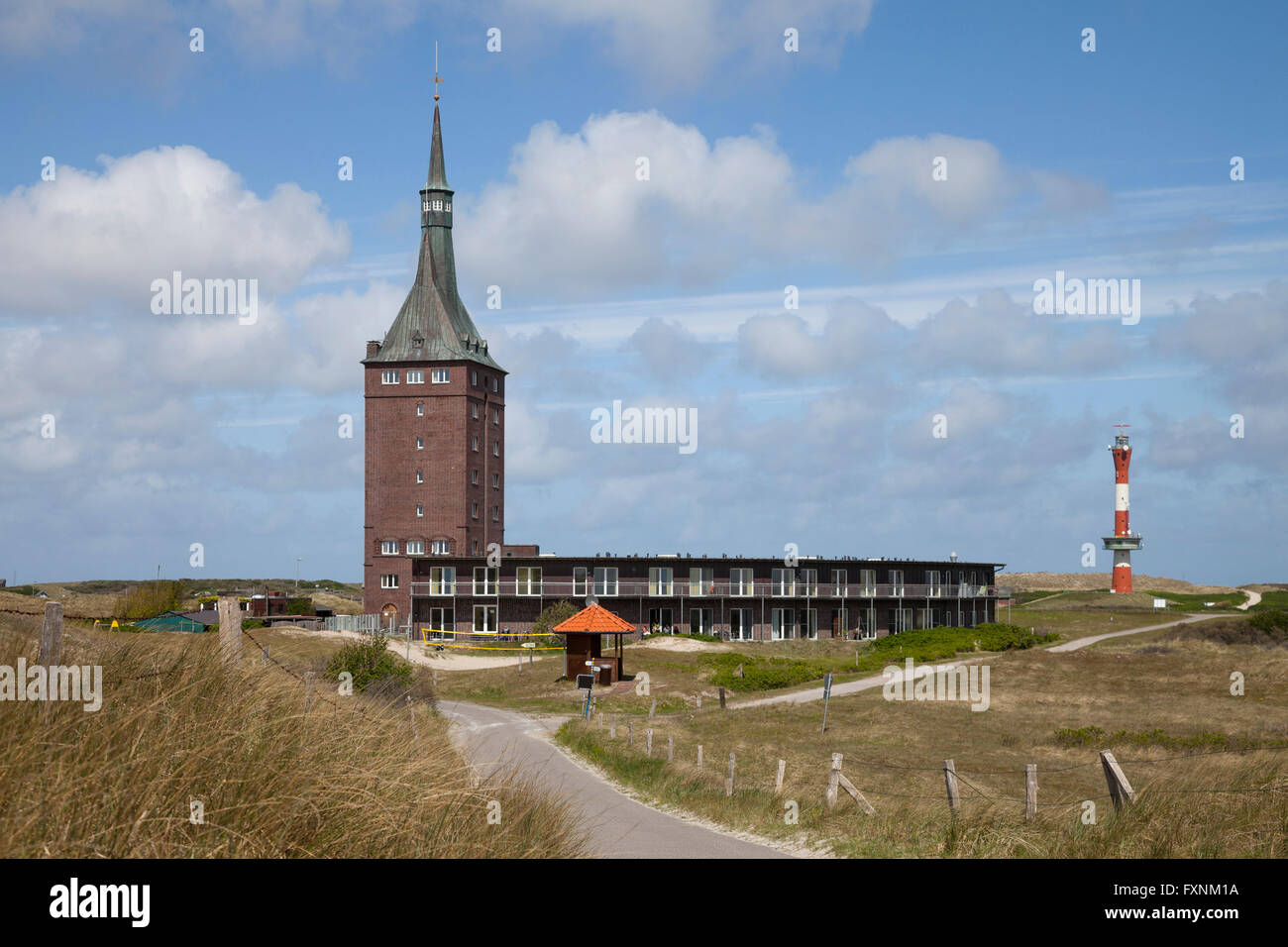 West tower with lighthouse on the island of wangerooge hi-res stock ...