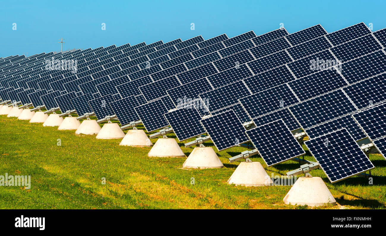Solar panels placed on a countryside meadow of apulia Stock Photo - Alamy