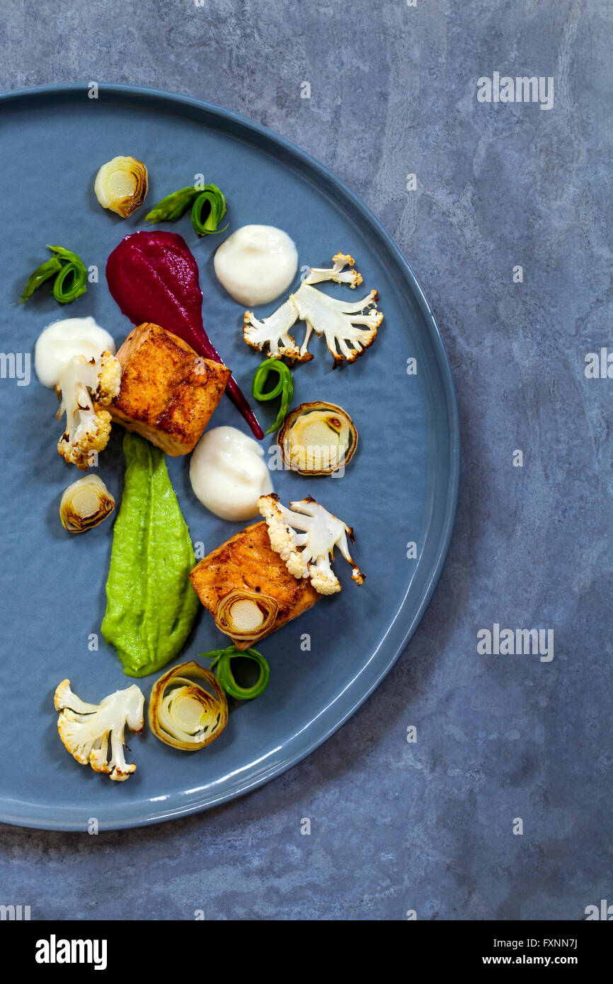 Pan fried salmon, pea puree, beetroot puree, cauliflower and asparagus ...