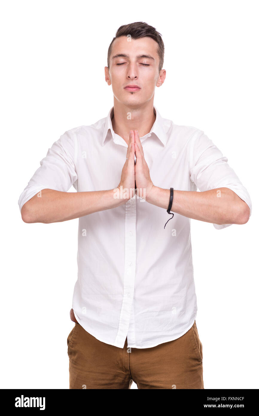 business man in namaste pose against isolated white Stock Photo - Alamy