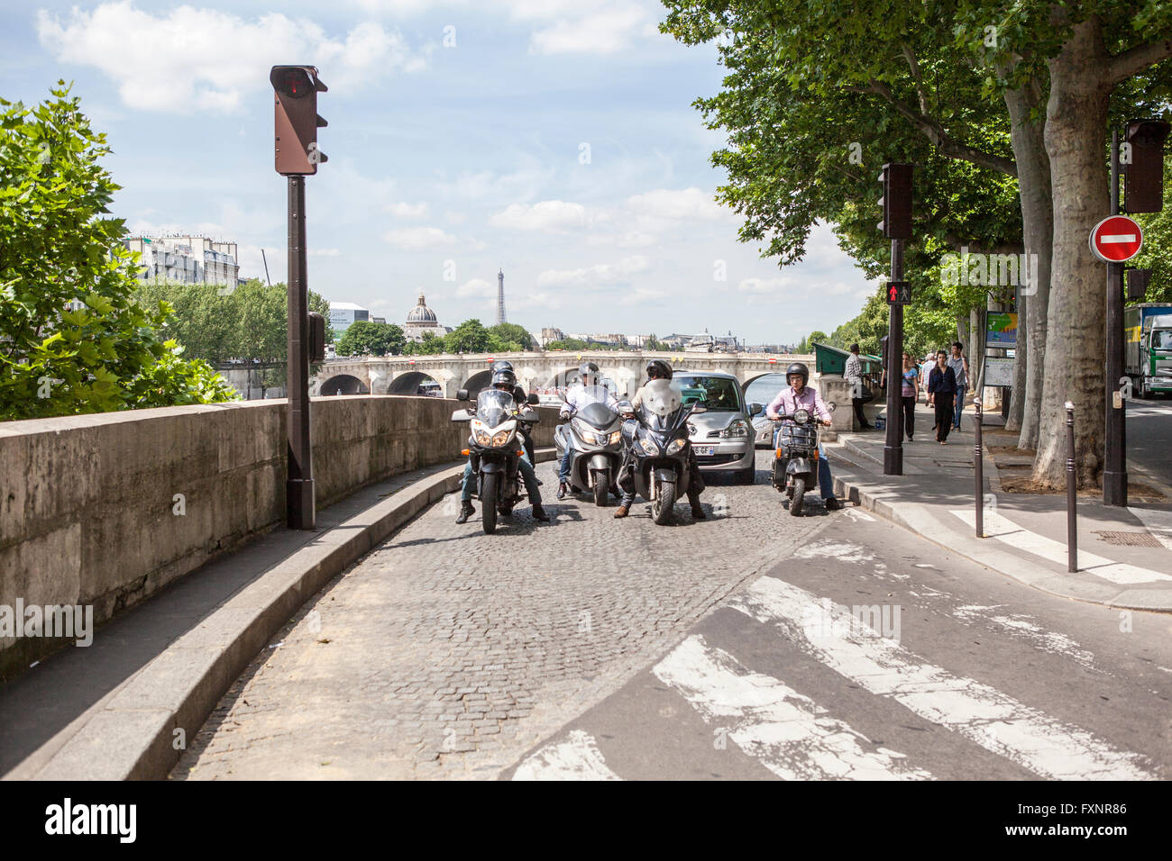motorcycles on city road of Paris, France Stock Photo - Alamy