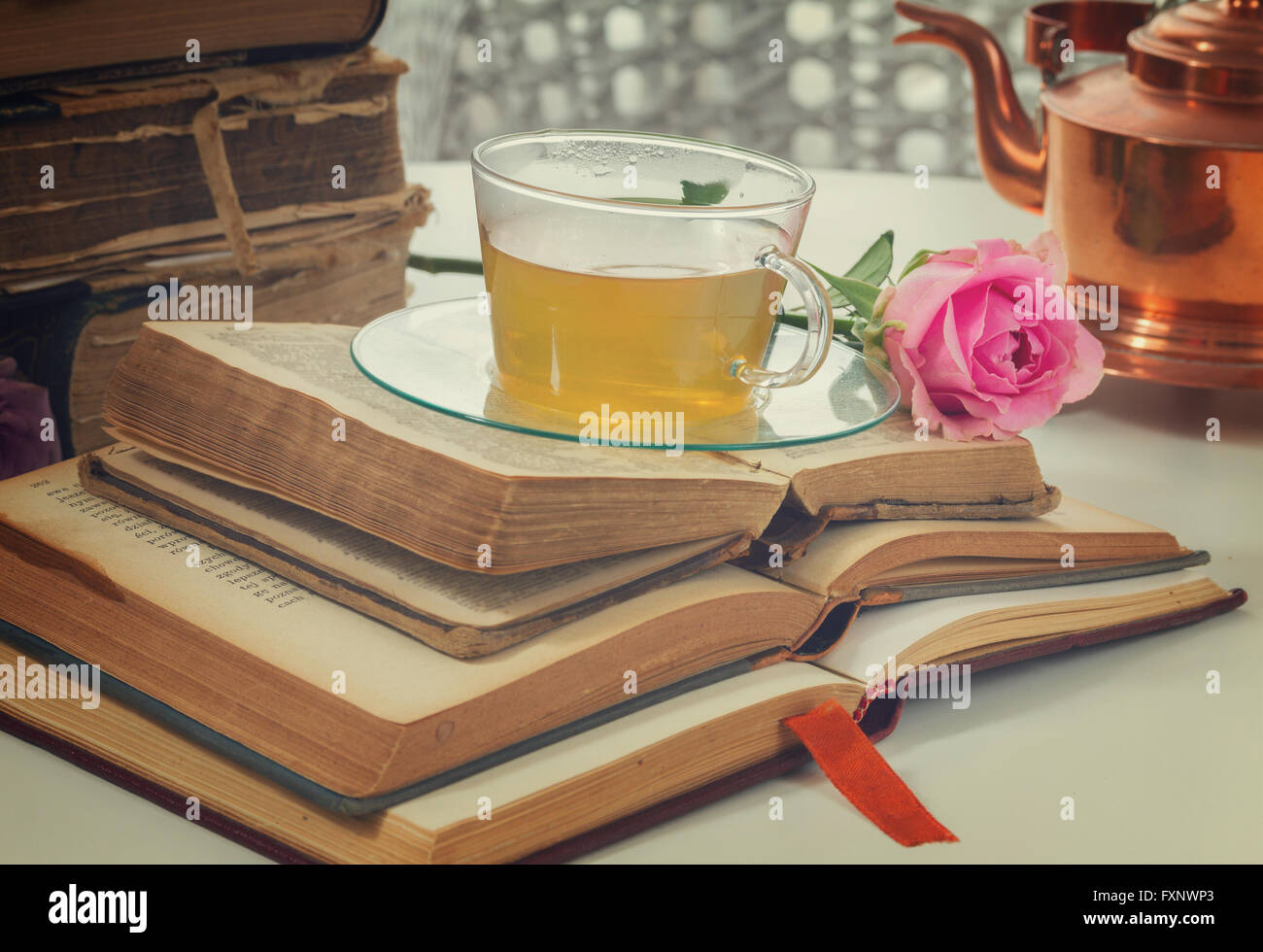 Cup of tea with books Stock Photo - Alamy