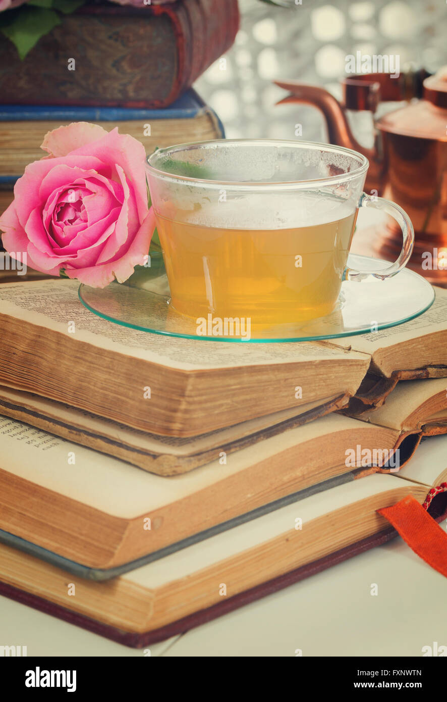 Cup of tea with books Stock Photo - Alamy