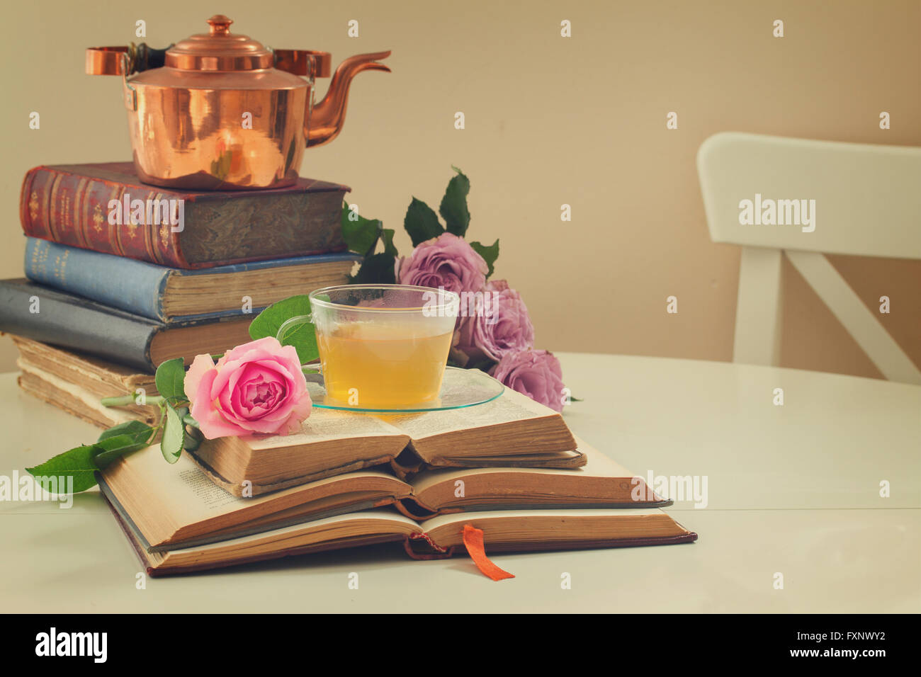 Cup of tea with books Stock Photo - Alamy