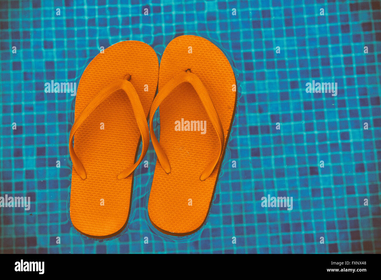flip flops in pool water Stock Photo - Alamy