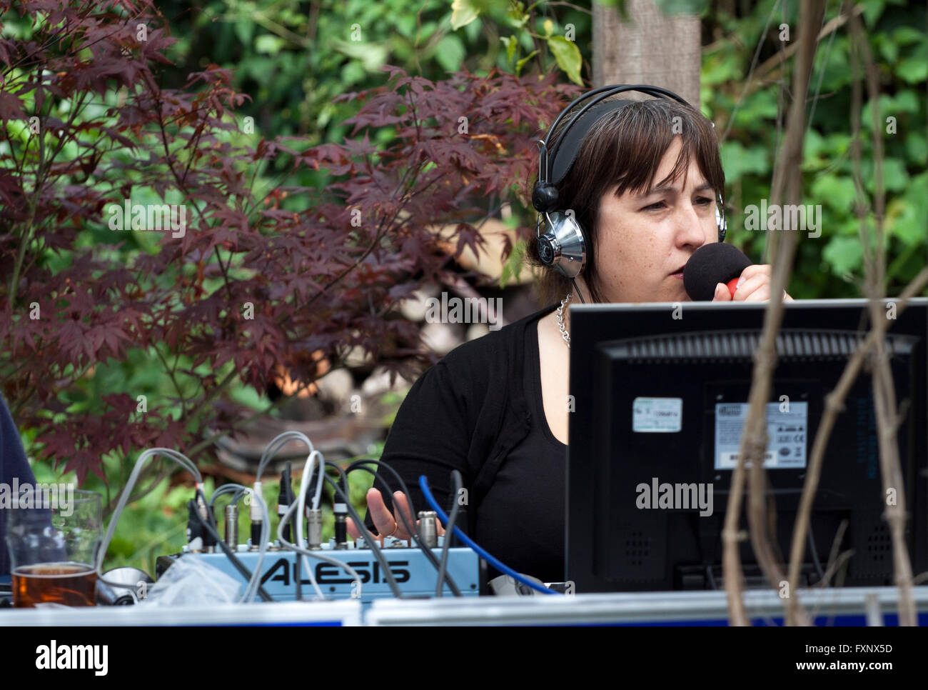 Disc disk jockey Kim Bannon making an outside broadcast for Internet ...