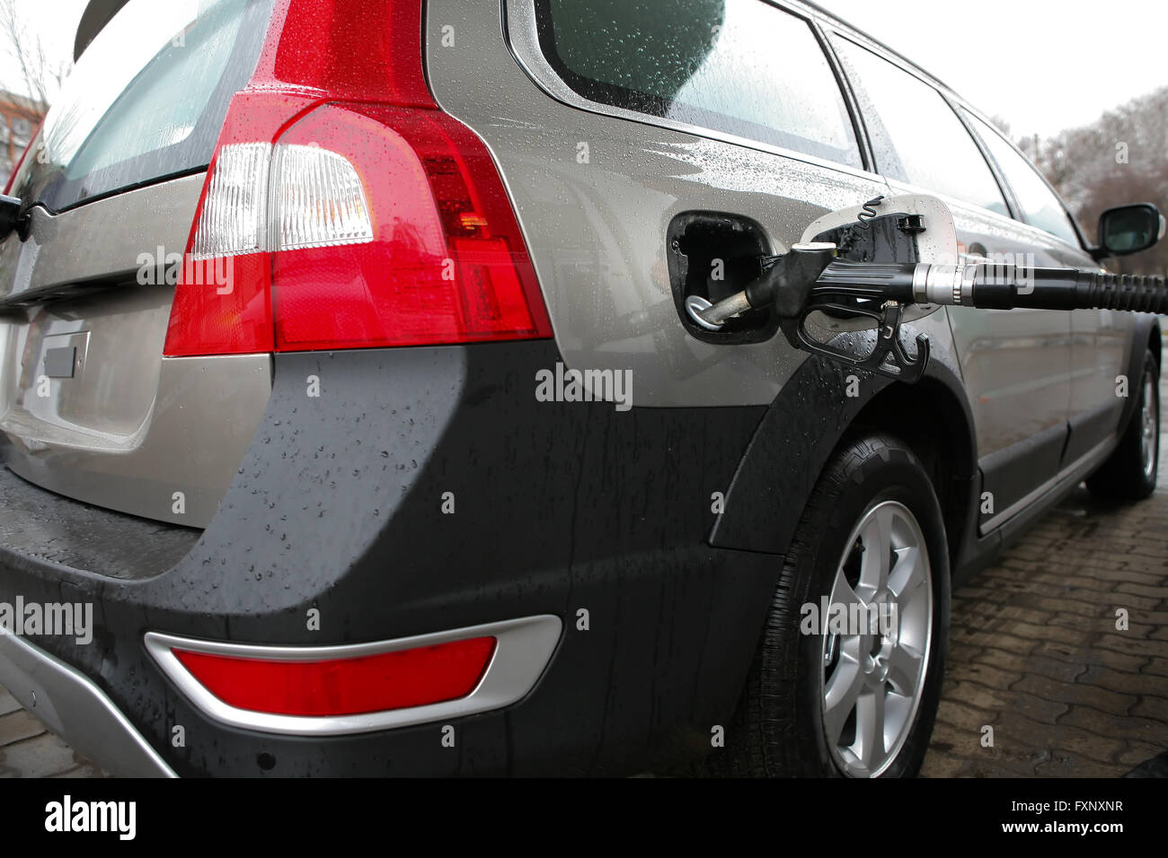 The new car on a filling station Stock Photo - Alamy