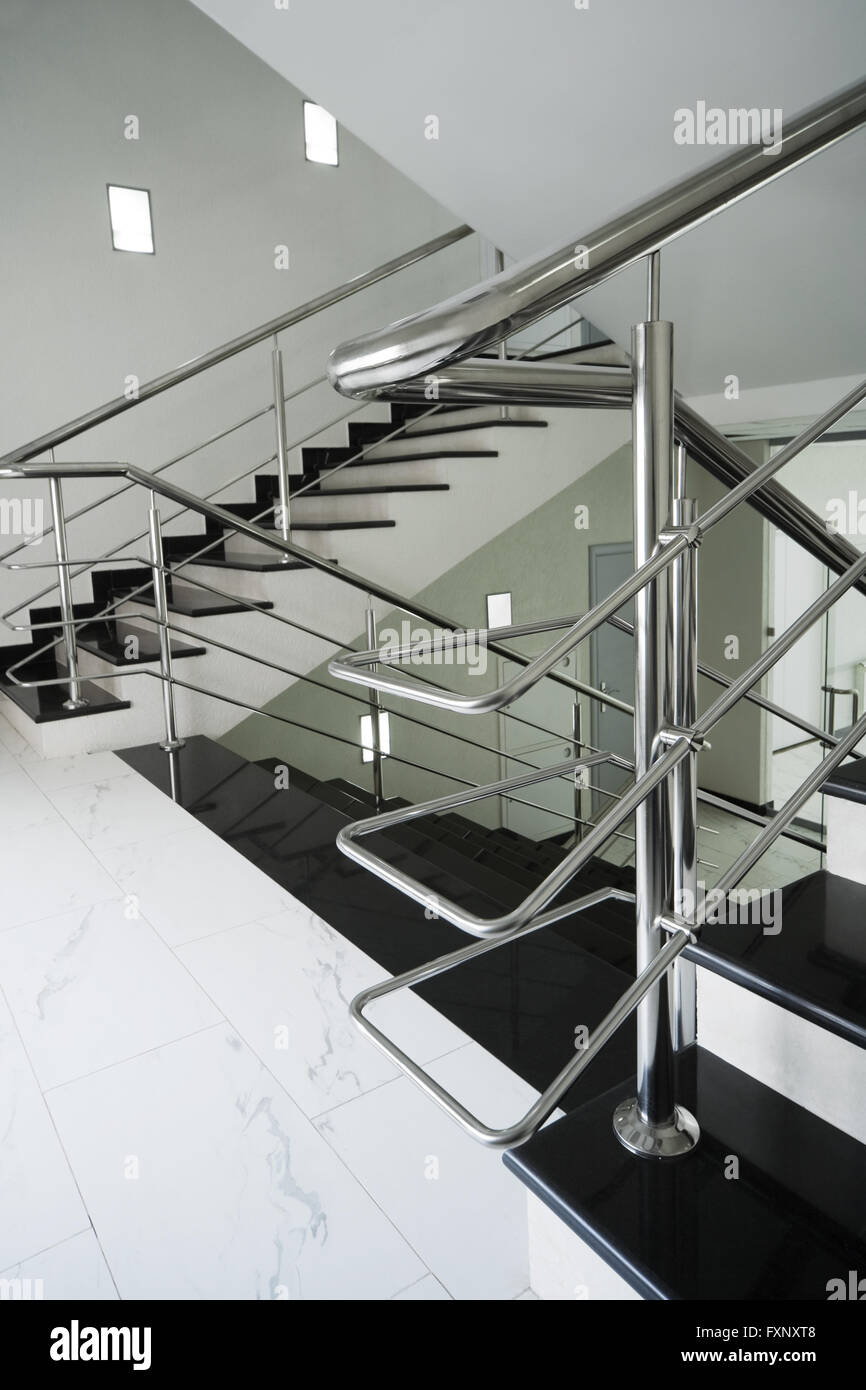 Marble staircase with a steel handrail in a modern building Stock Photo ...