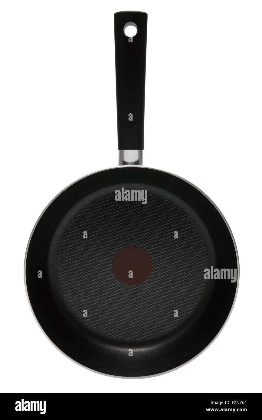 New frying pan on a white background Stock Photo - Alamy