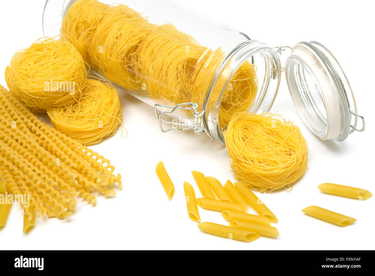 pasta in glass can on a white background Stock Photo - Alamy
