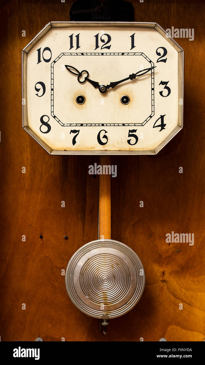 vintage antique clock with pendulum Stock Photo - Alamy