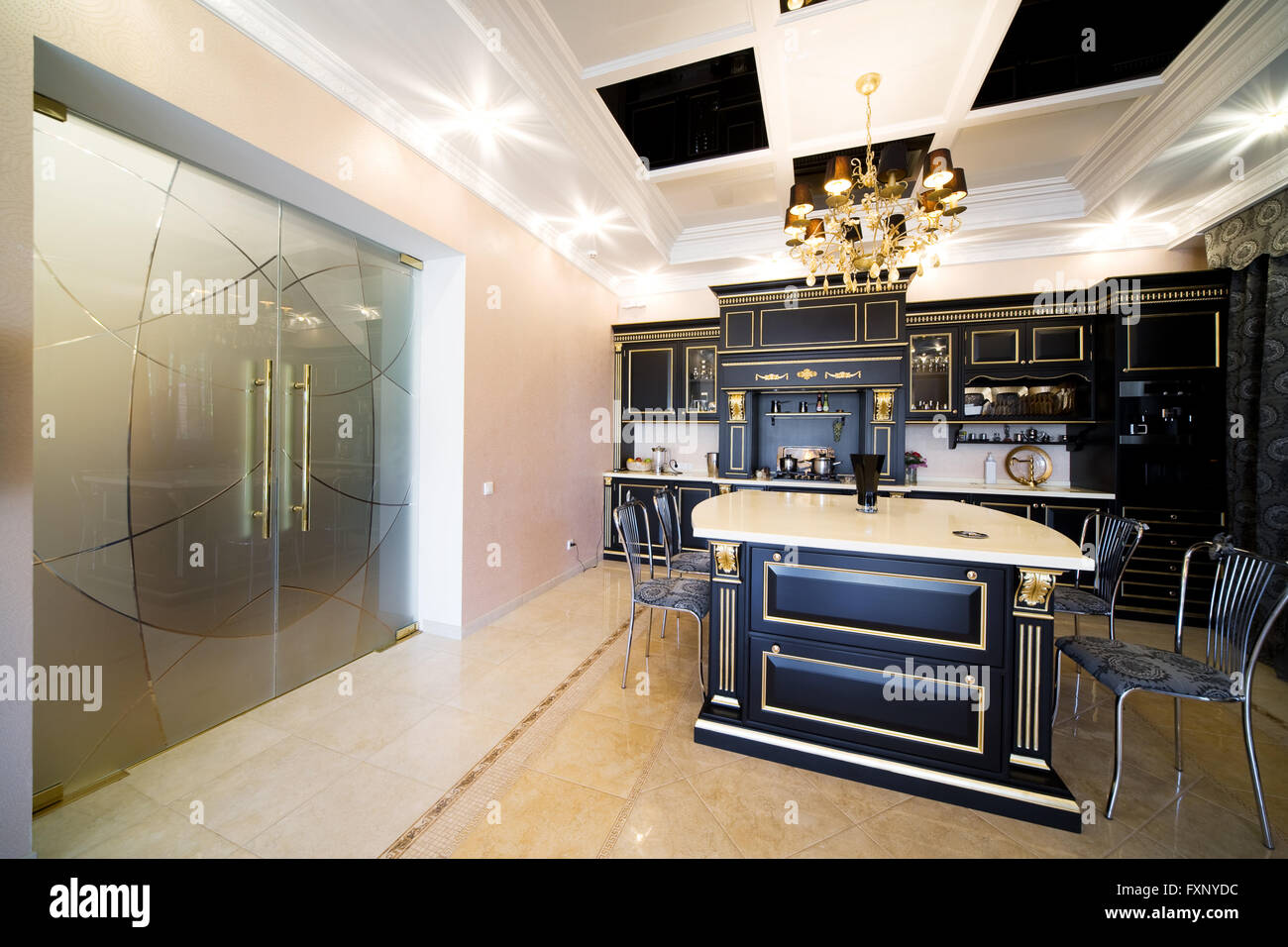 Wide glass doors on beautiful modern kitchen Stock Photo - Alamy