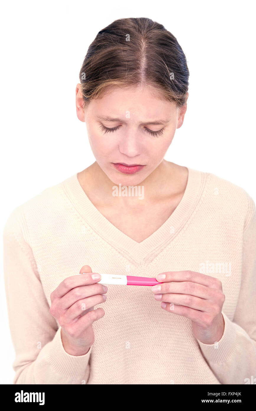 MODEL RELEASED. Woman holding pregnancy test Stock Photo - Alamy