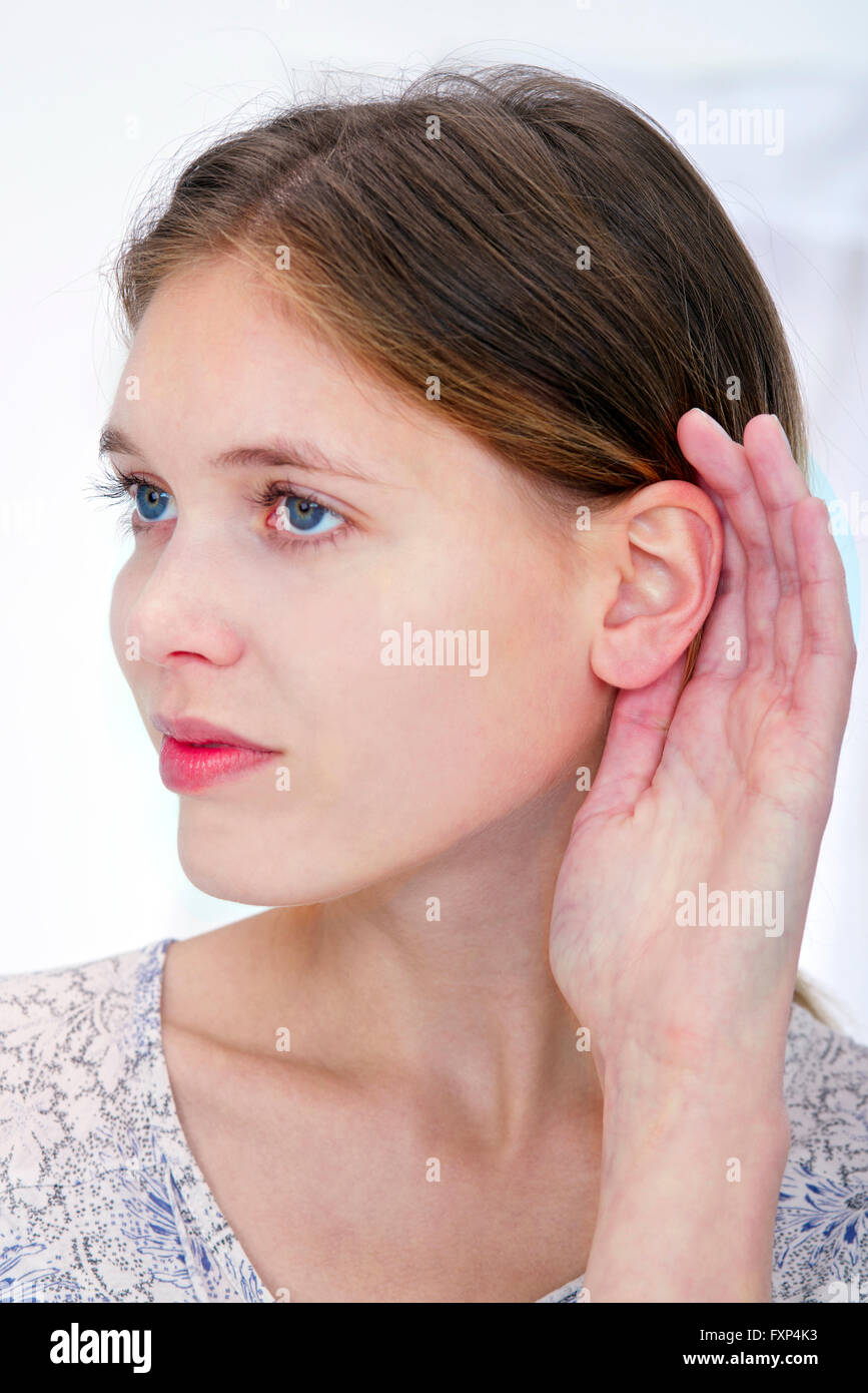 Hand to ear hi-res stock photography and images - Alamy