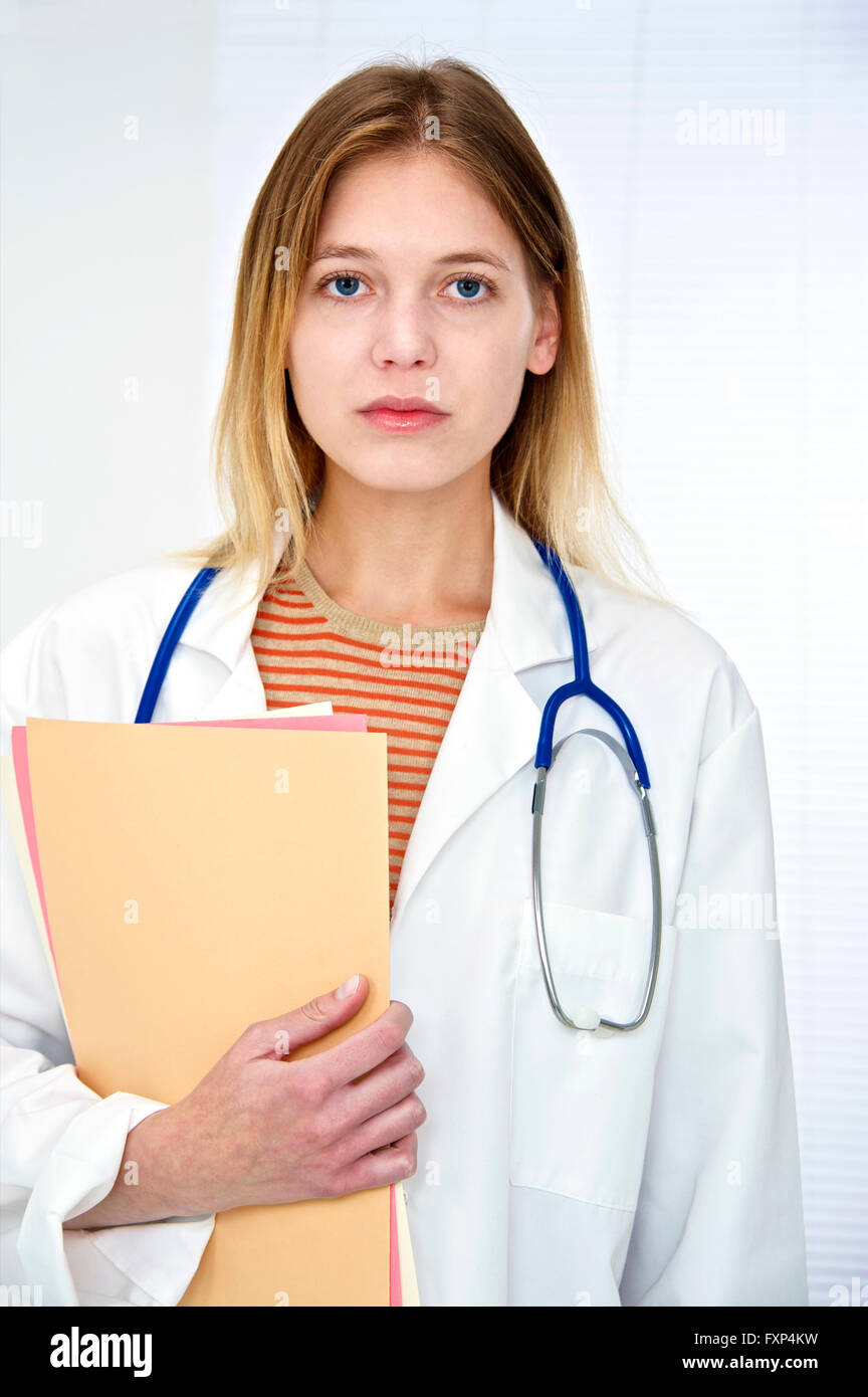 Female doctor holding document hi-res stock photography and images - Alamy