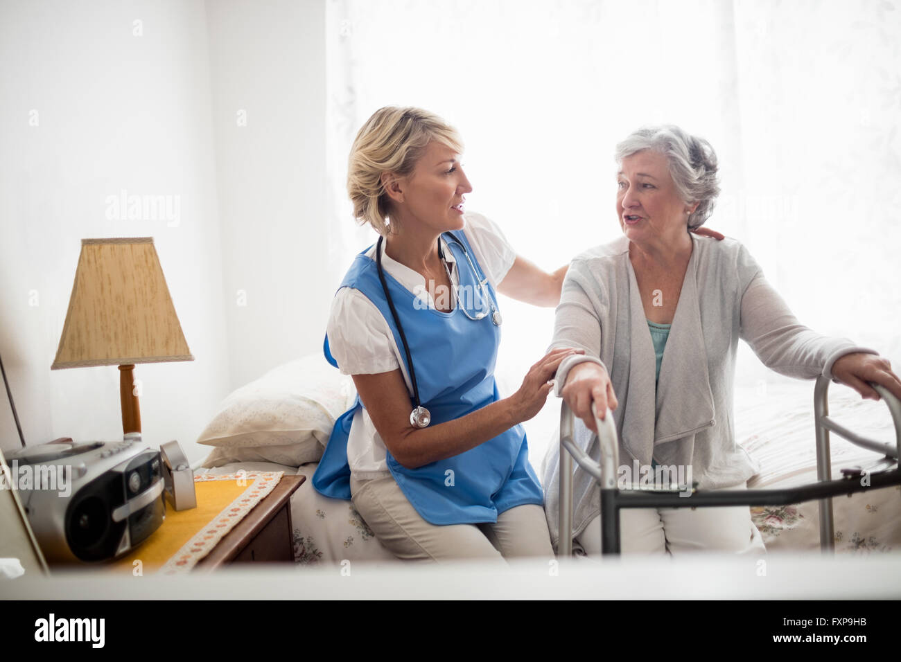 Helping patient stand hi-res stock photography and images - Alamy