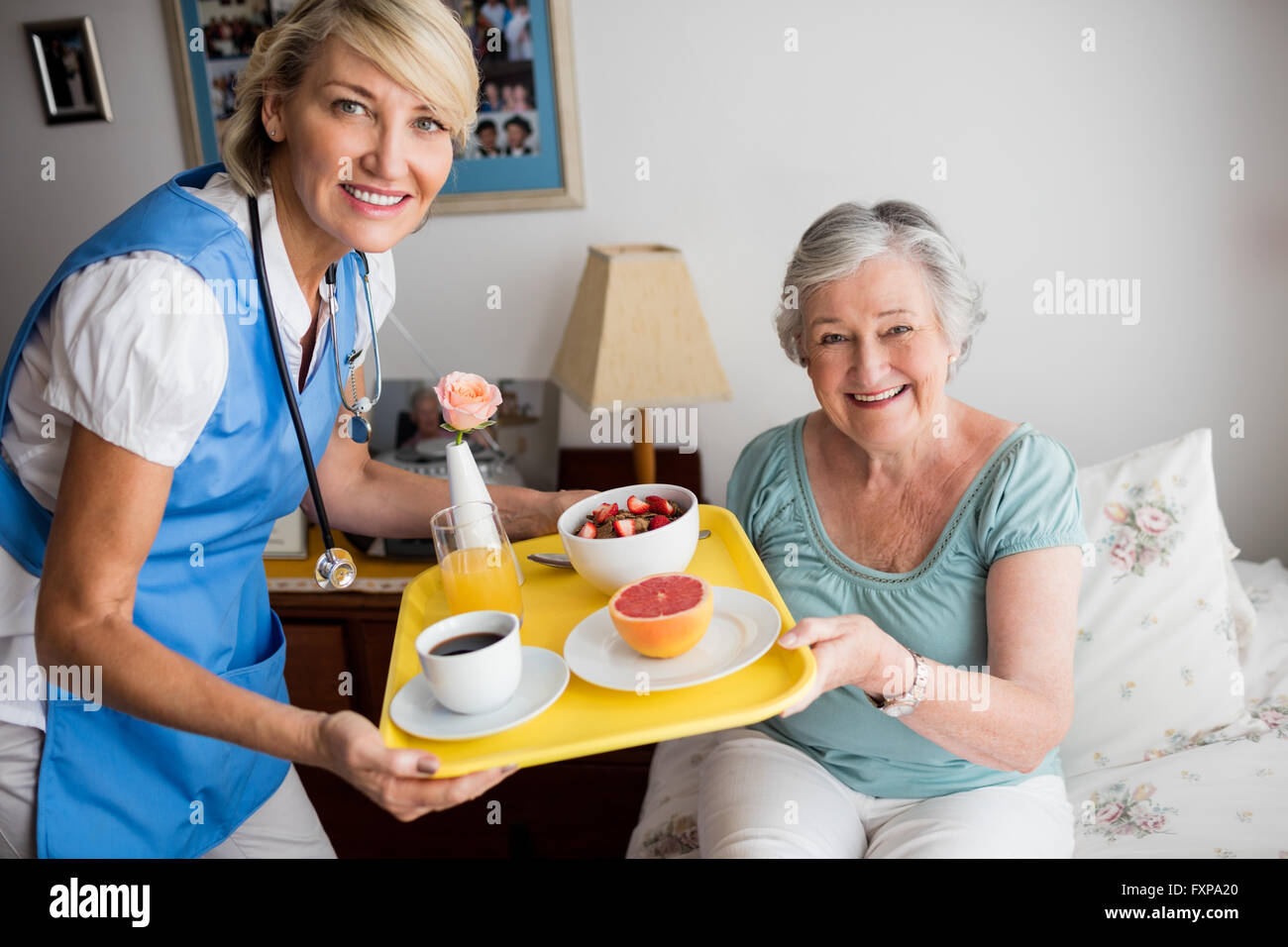 Female nurse giving medicine senior hi-res stock photography and images ...