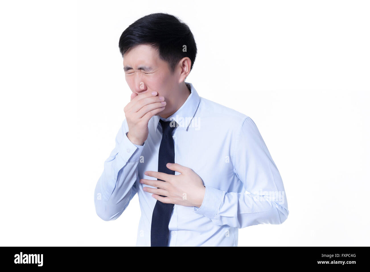 Asian businessman suffering from a bad cough Stock Photo - Alamy