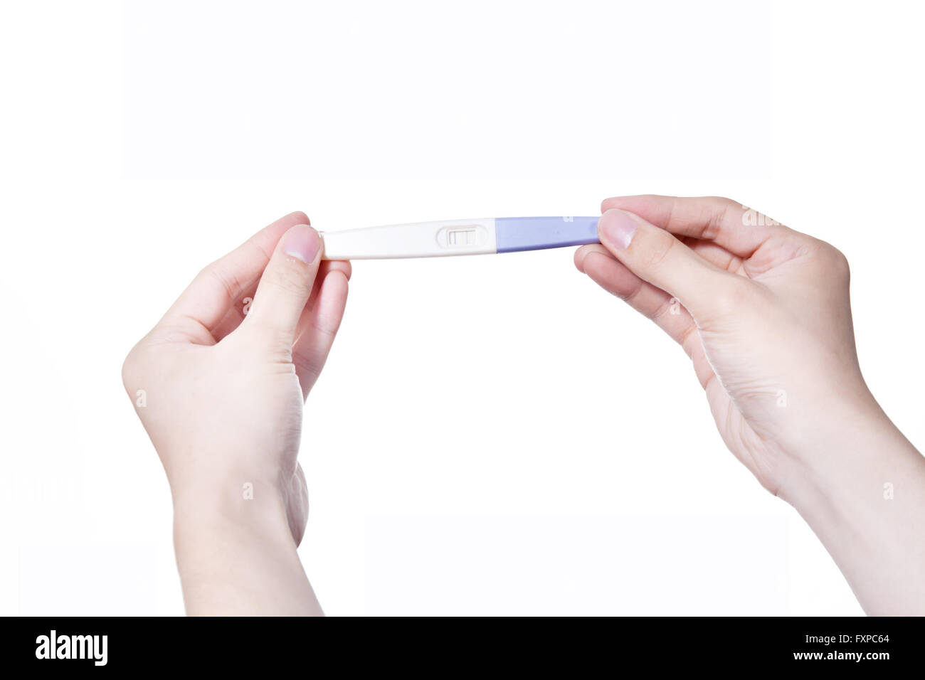 Two hands holding Positive Pregnancy Test on Isolated White Stock Photo ...