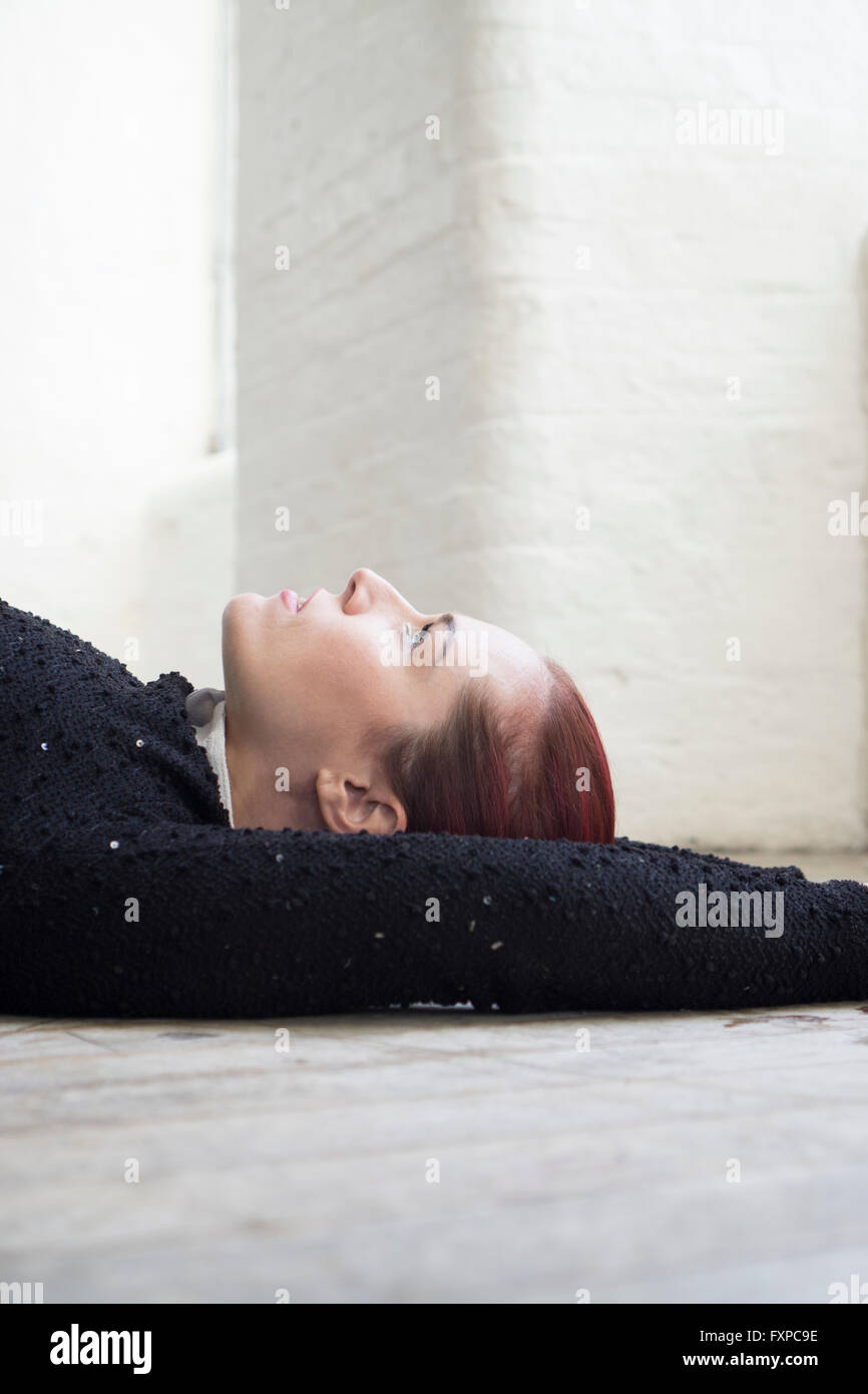 Woman face looking down profile hi-res stock photography and images - Alamy