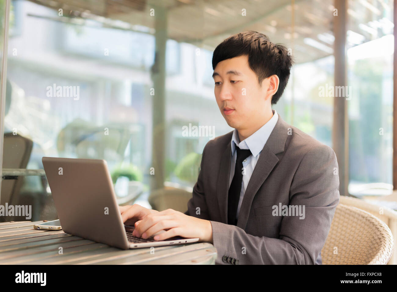 Young asian programmer working hi-res stock photography and images - Alamy