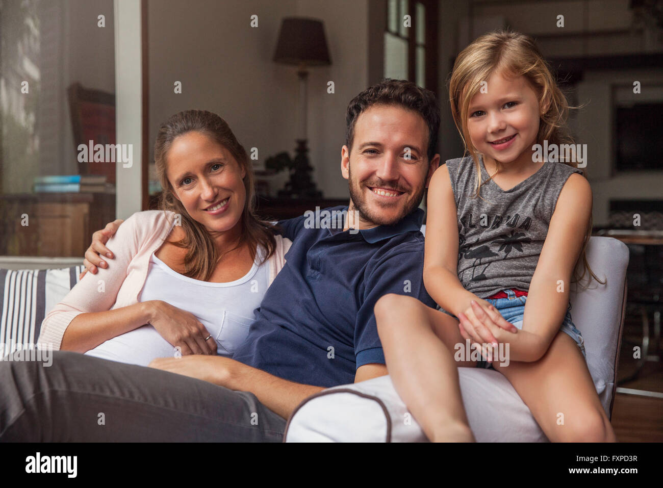 Family at home together, portrait Stock Photo - Alamy