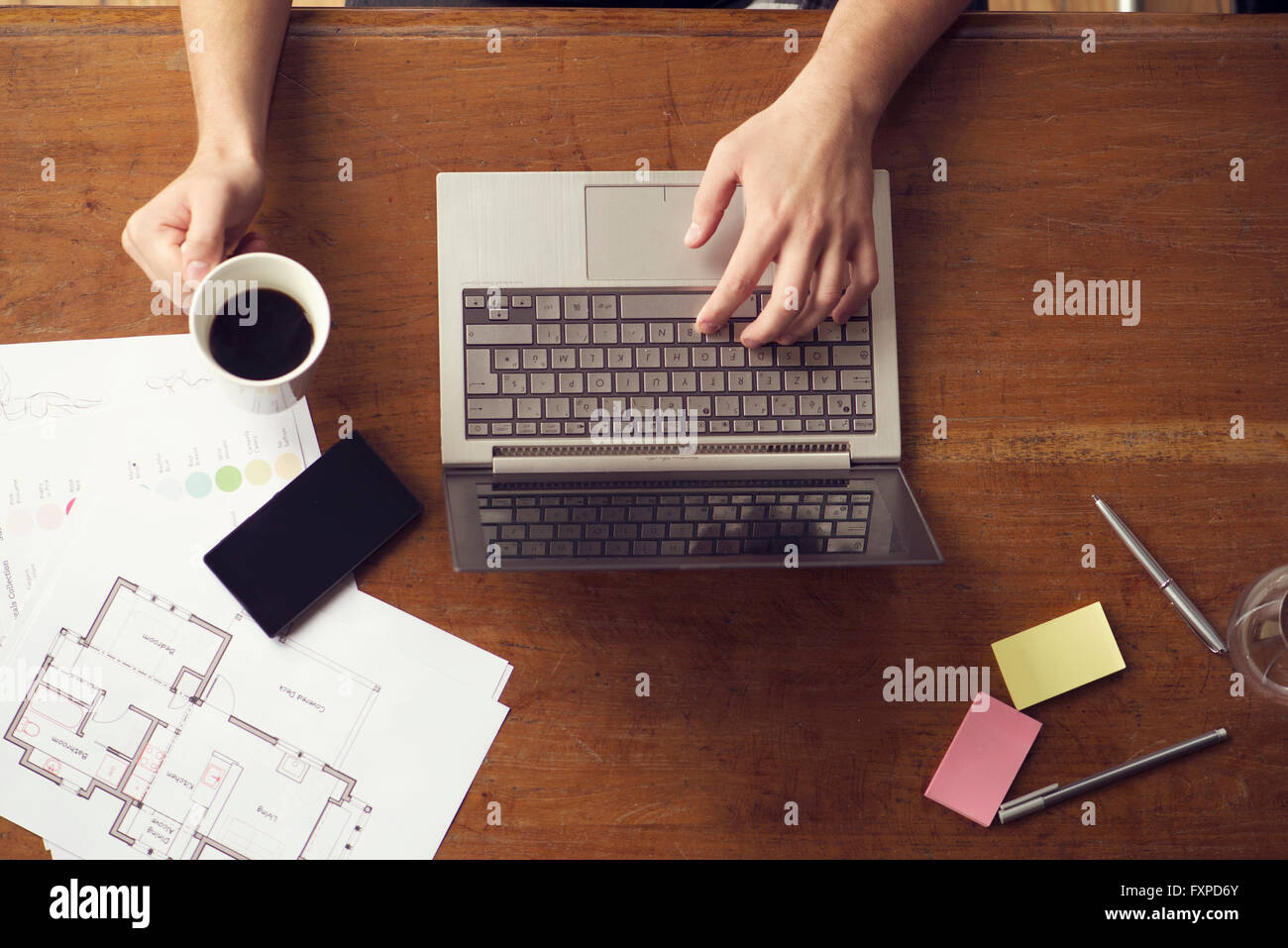 Man at work using laptop Stock Photo - Alamy