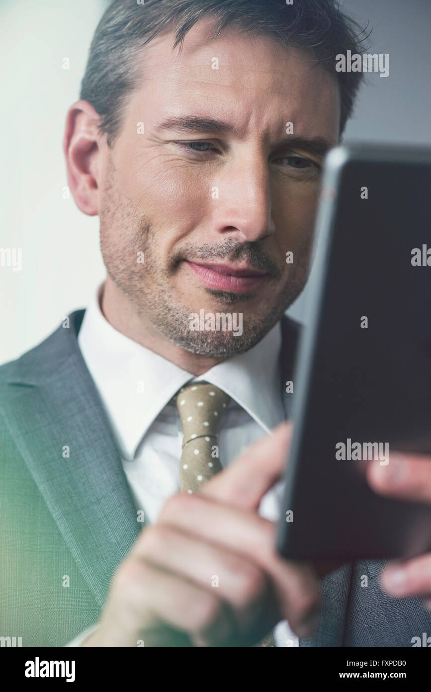 Businessman using digital tablet Stock Photo - Alamy Businessman using digital tablet Stock Photo - Alamy
