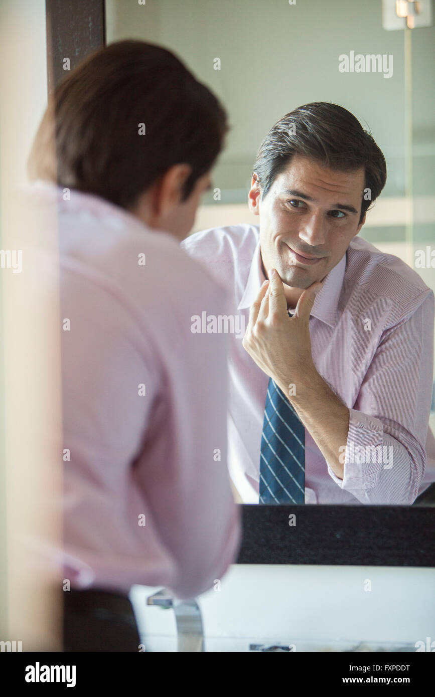 Business man reflected in mirror hi-res stock photography and images ...