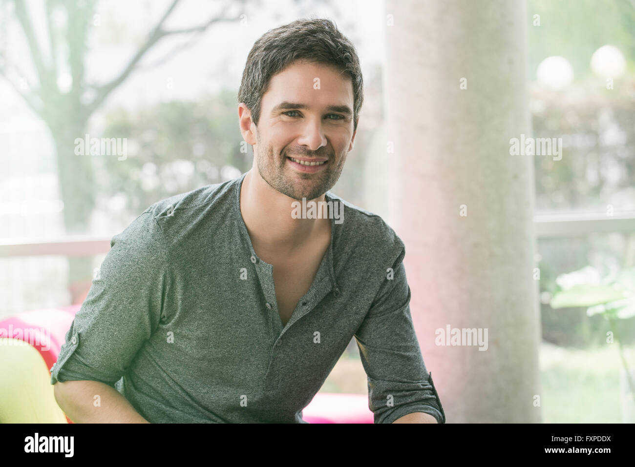 Happy well dressed man male 30s hi-res stock photography and images - Alamy
