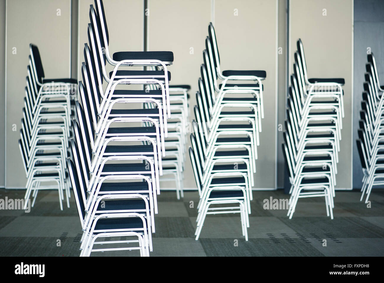 Stacks of chairs Stock Photo - Alamy