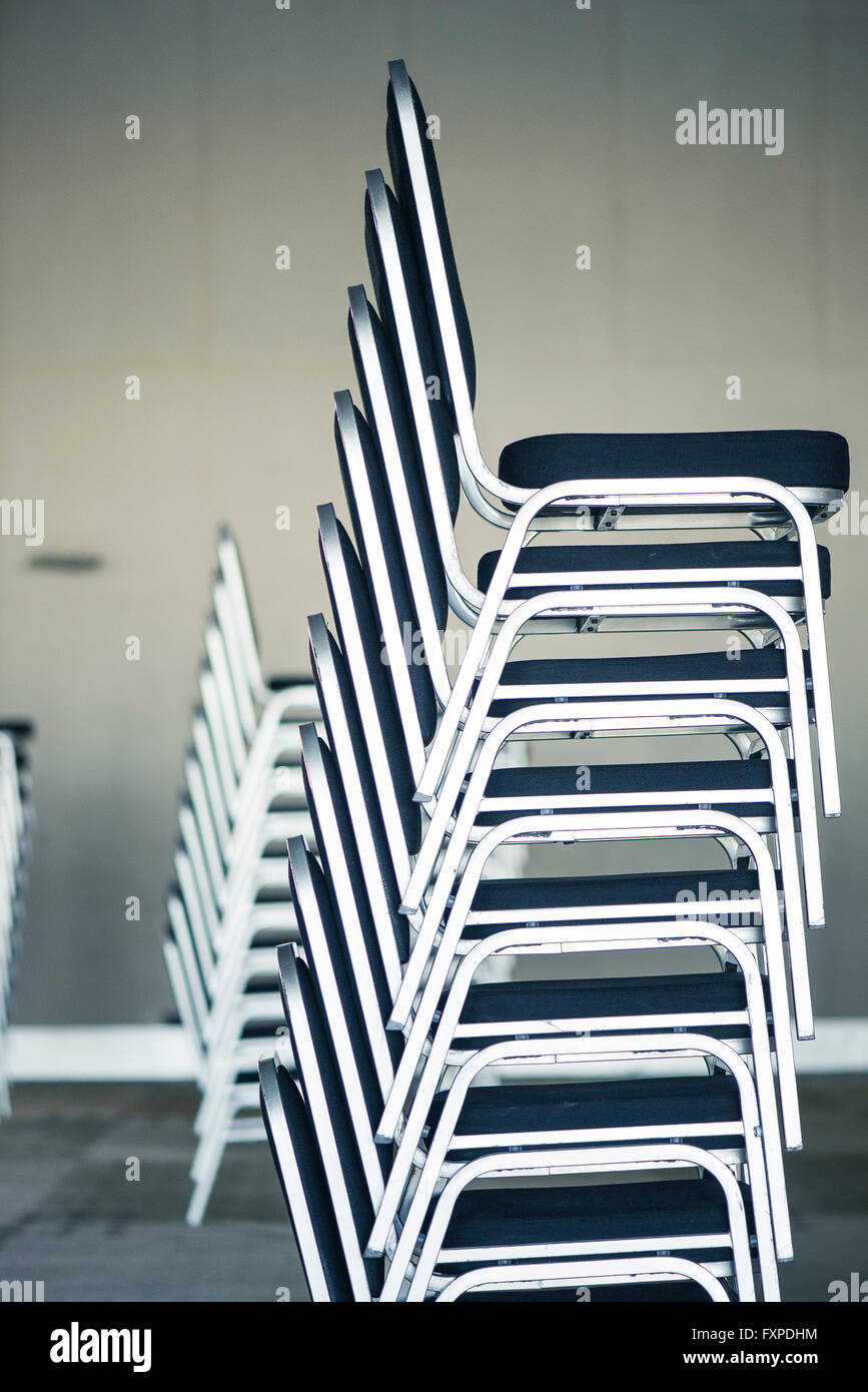 Side view of stacked chairs hi-res stock photography and images - Alamy