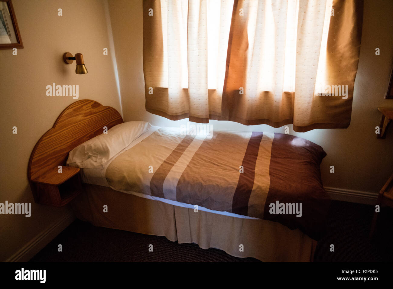View of bed in bedroom Stock Photo - Alamy