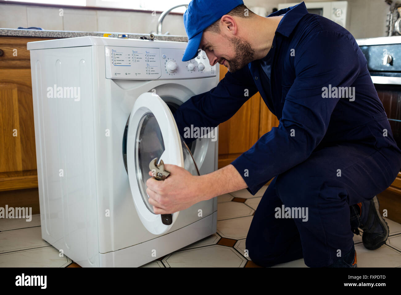 Washing machine repair hi-res stock photography and images - Alamy